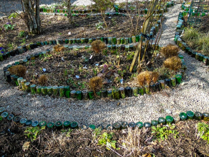 20 Epic Ways To Reuse Glass Bottles in Your Garden